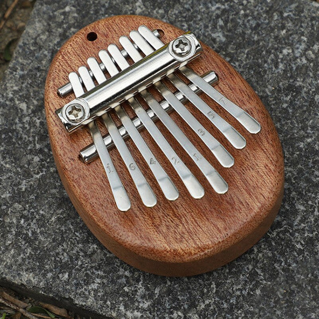 8 Keys Kalimba Brown Mahogany Egg Shape – OcarinaKalimba